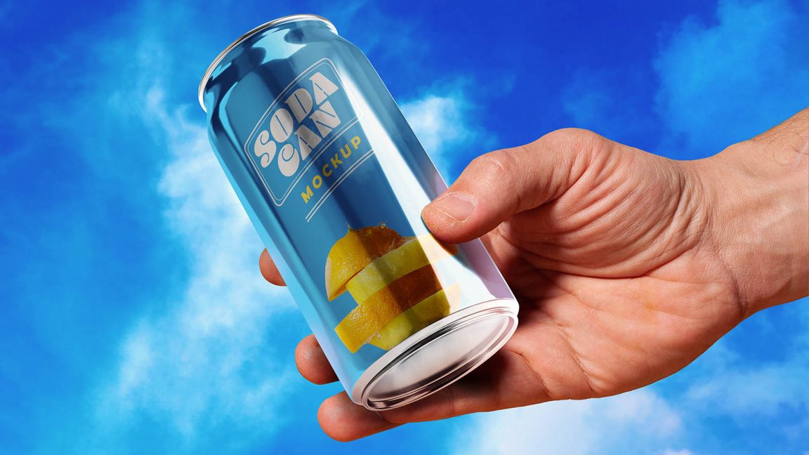Free Hand Holding Realistic Tin Can Mockup - Free Package Mockups