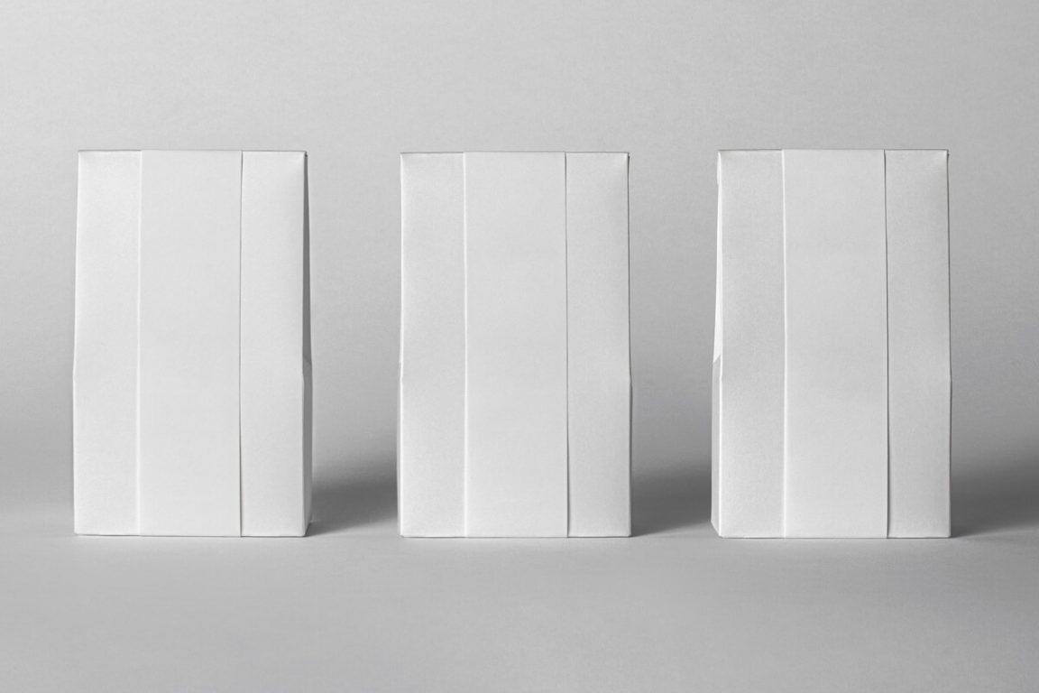 Front View of Three Classic Cardboard Paper Pouch Packaging Mockup ...