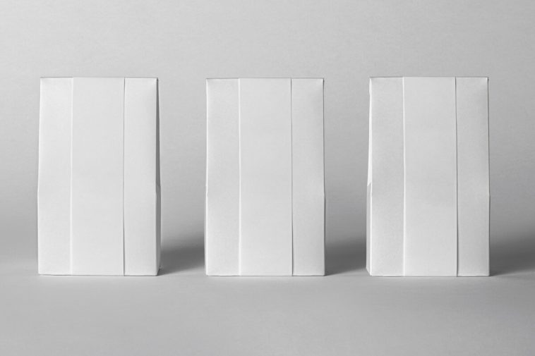 Front View of Three Classic Cardboard Paper Pouch Packaging Mockup - Free Packaging Mockup