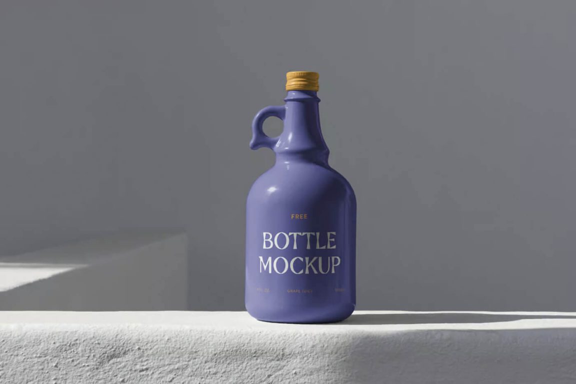 Free Classic Ceramic Bottle Mockup Standing on Concrete - PacageMockup